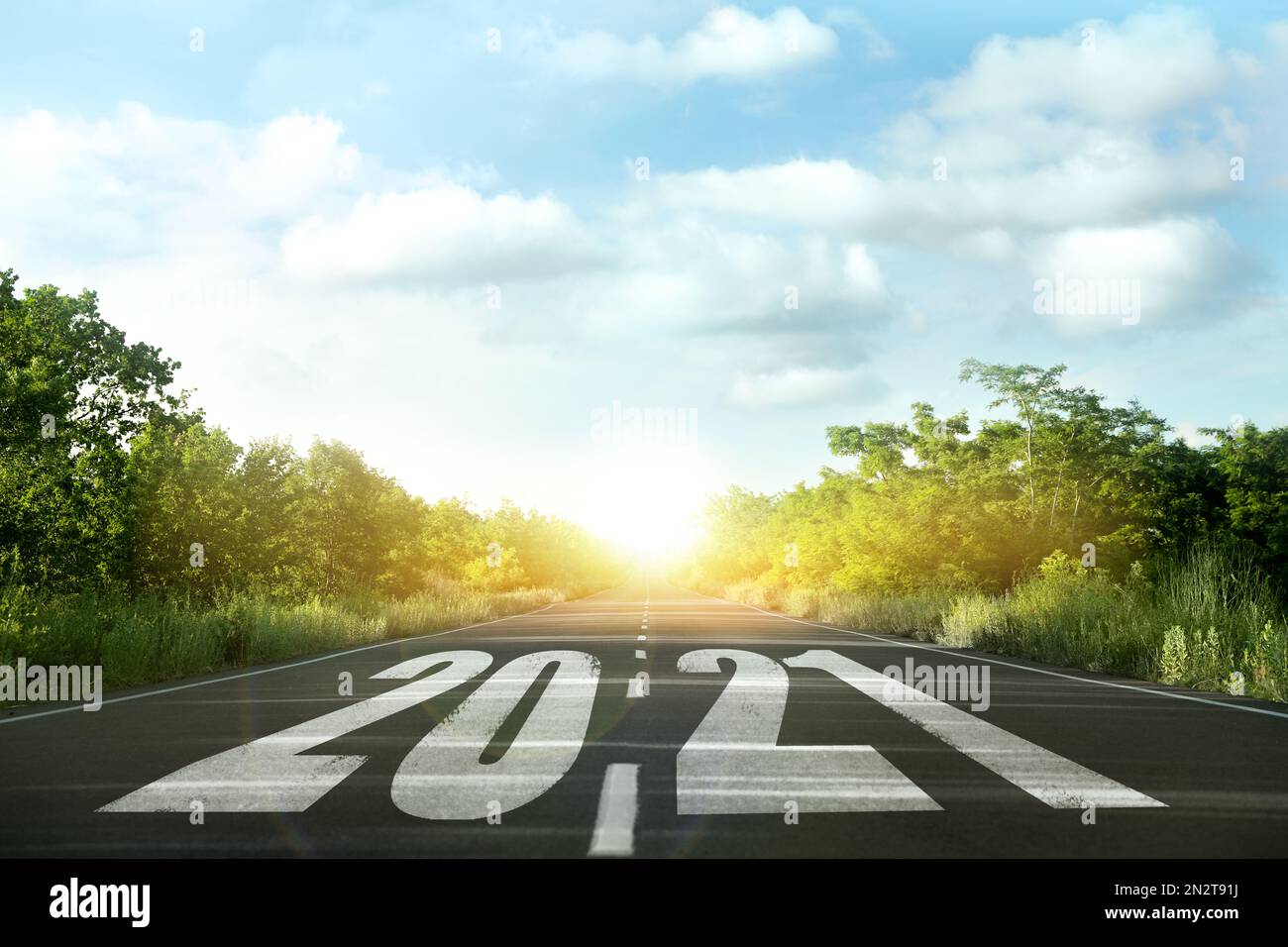 Start new year with fresh vision and ideas. 2021 numbers on asphalt ...