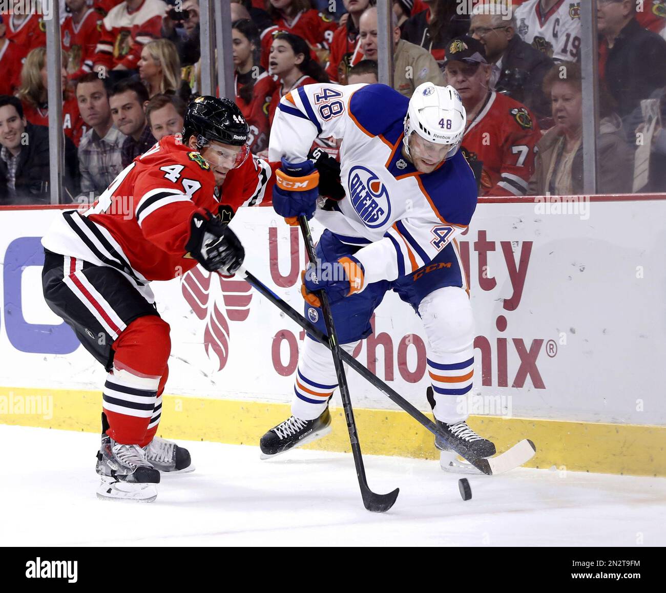Chicago Blackhawks defenseman Kimmo Timonen (44) battles Edmonton ...