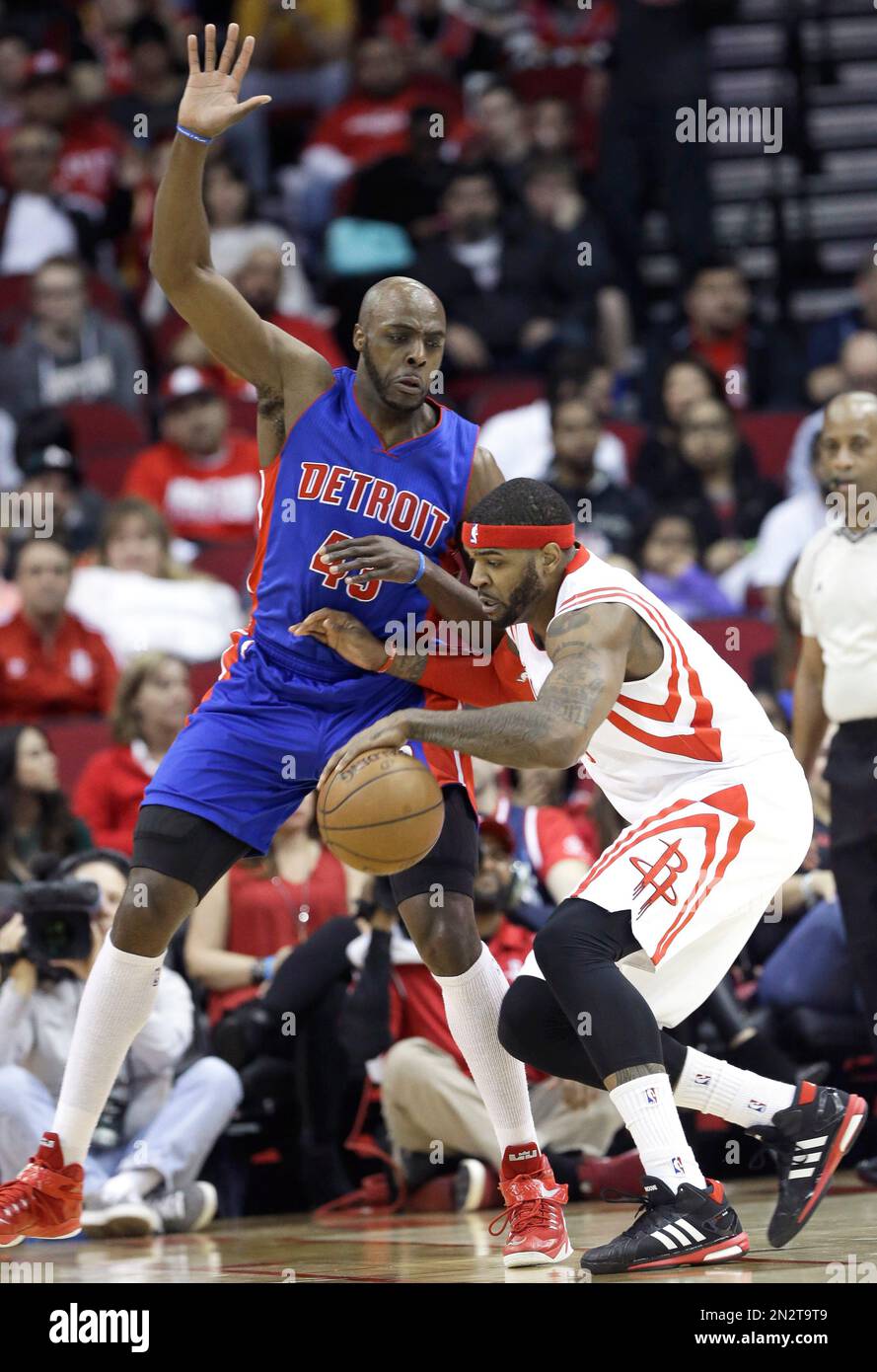 Houston Rockets' Josh Smith, right, drives the ball around Detroit ...