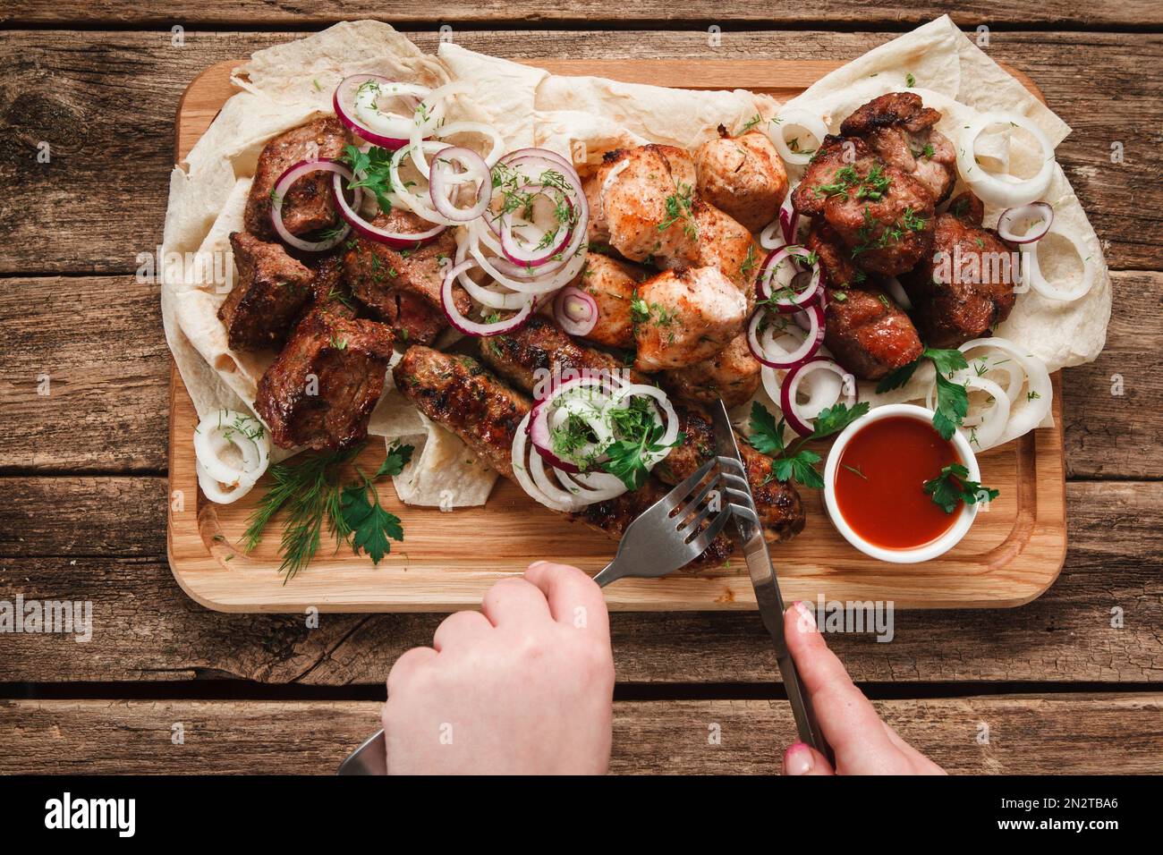 Grilled meat mix. Junk food, unhealthy eating Stock Photo - Alamy