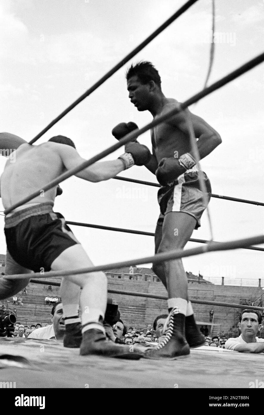 American middleweight champion Sugar Ray Robinson, right, has opponent ...