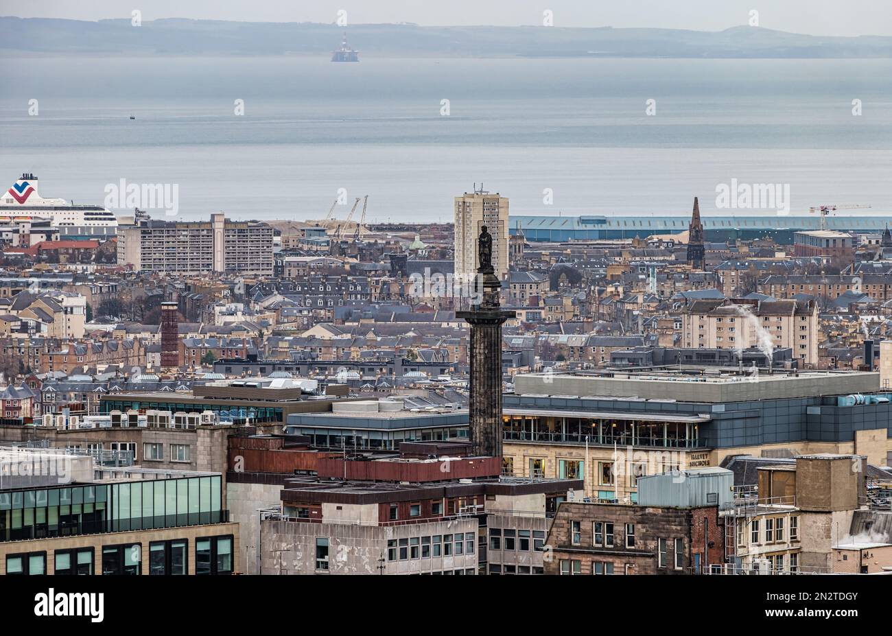 View across city centre to Firth of Forth with Henry Dundas monument ...