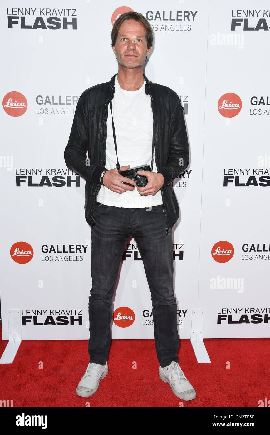 Roger Horn attends "Flash by Lenny Kravitz" Photo Exhibition at Leica ...