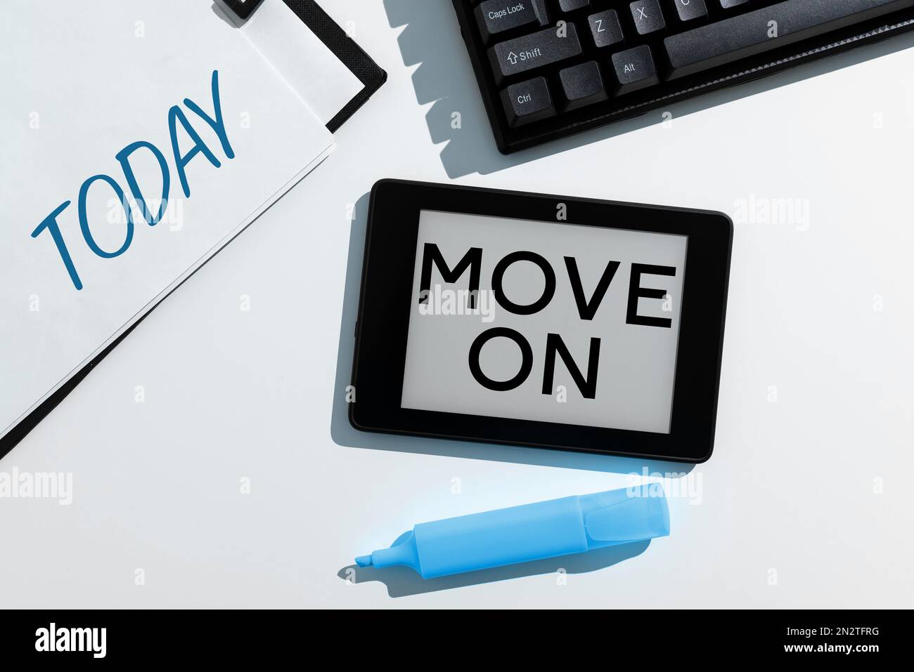 Hand writing sign Move On, Word Written on to leave the place where you ...