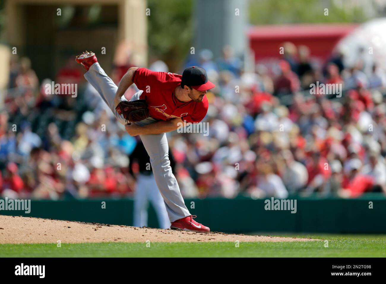 St. Louis Cardinals pitcher Tim Cooney throws during an exhibition ...