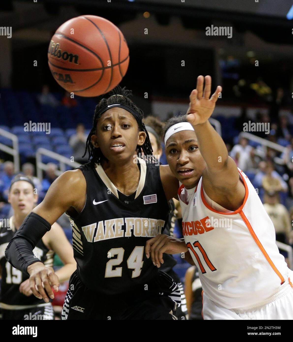 Wake Forest's Kelila Atkinson (24) and Syracuse's Cornelia Fondren (11 ...