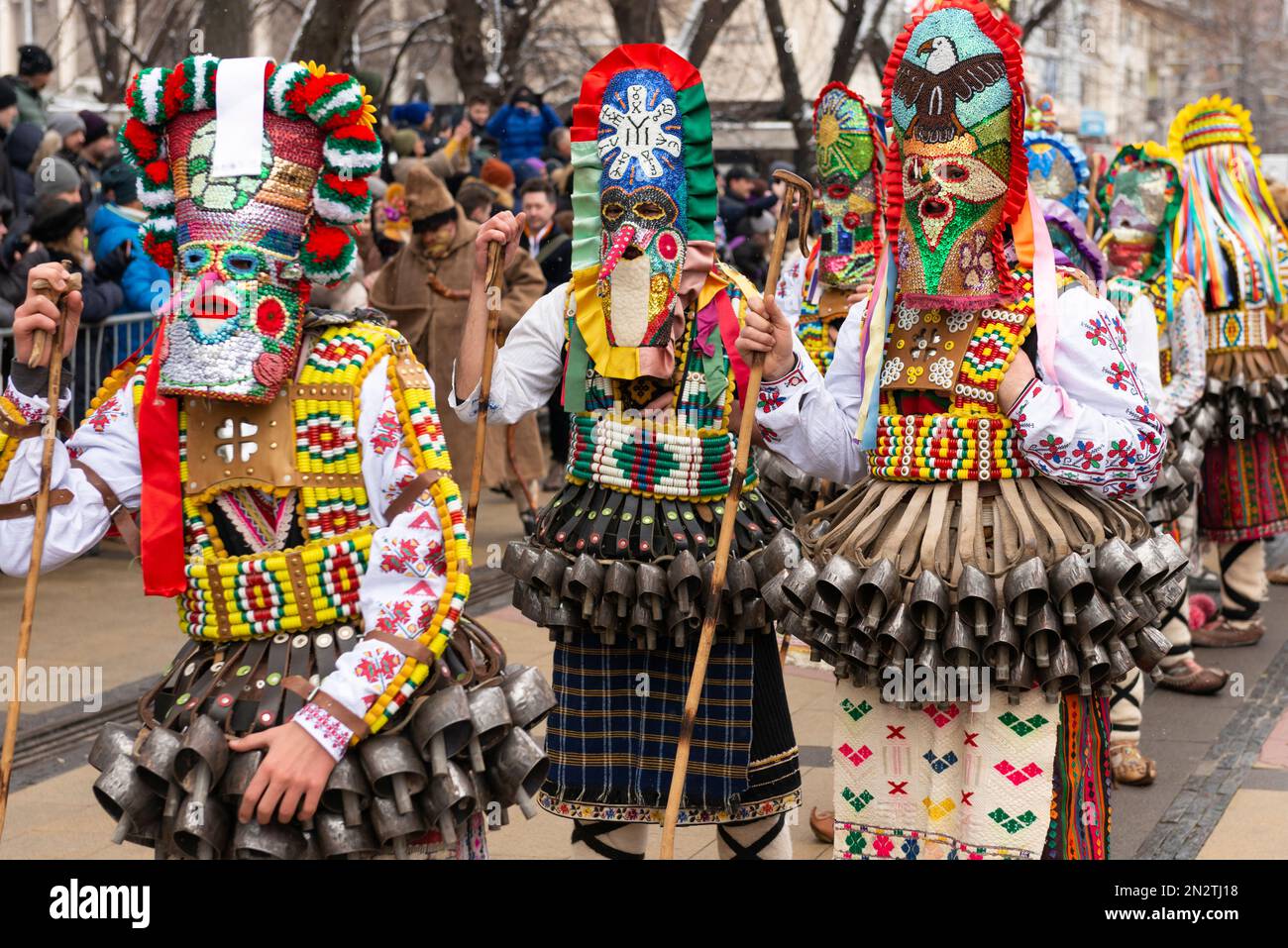 Masked dancers with colorful masks from Central Bulgaria region at the ...