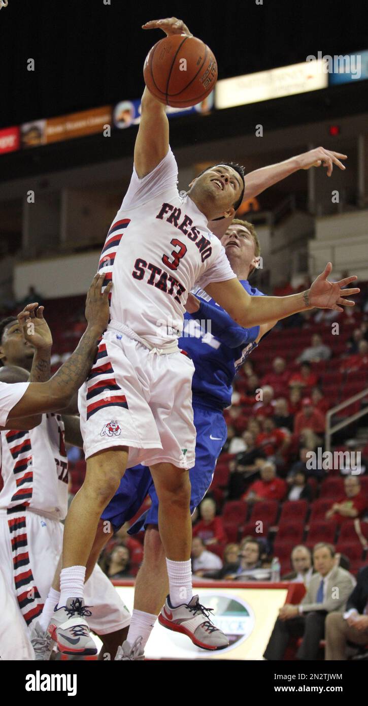 Fresno State's Cezar Guerrero goes for a rebound against Air Force's ...