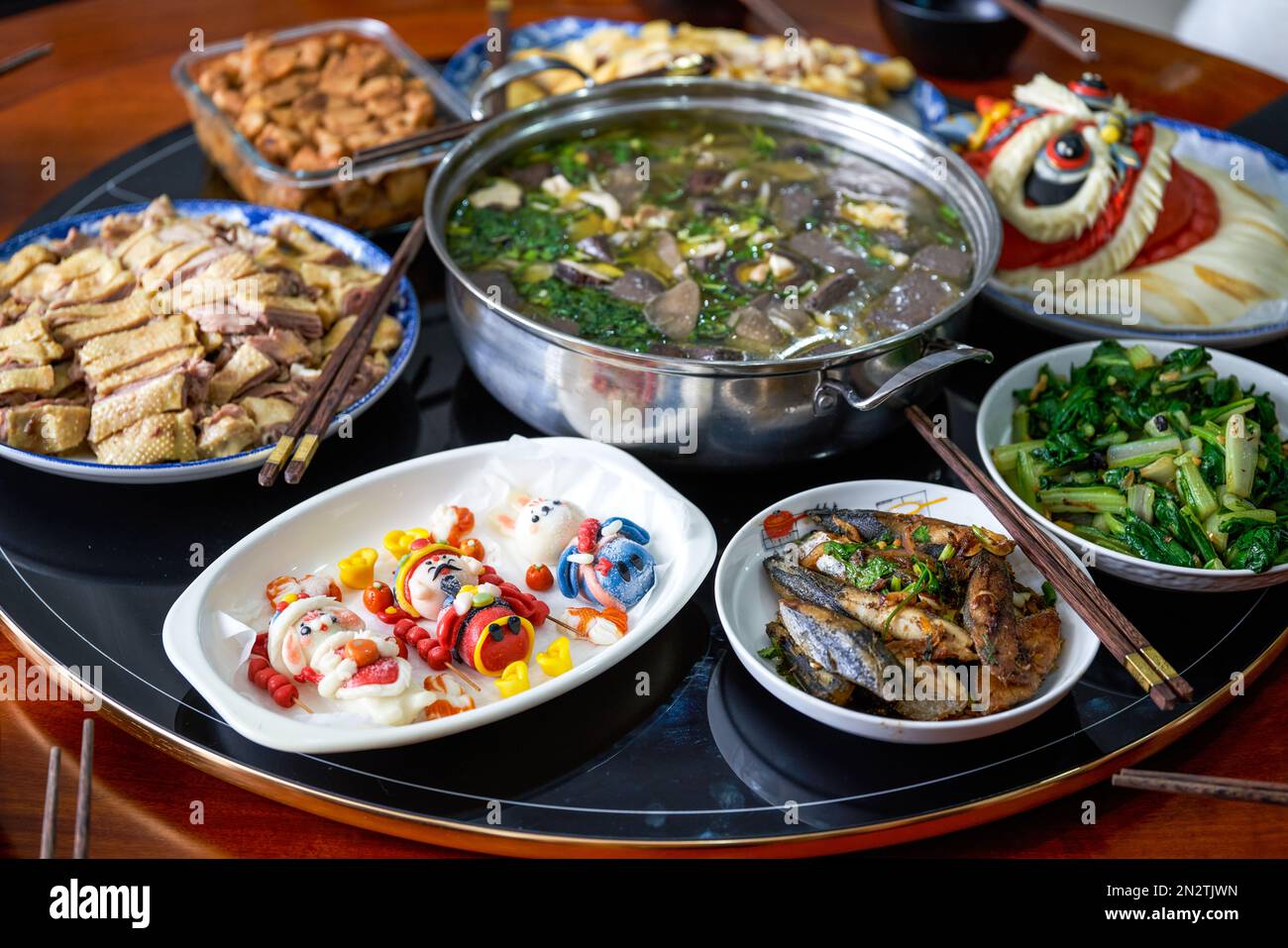 A table of New Year's Eve dinner for Chinese New Year reunion Stock ...