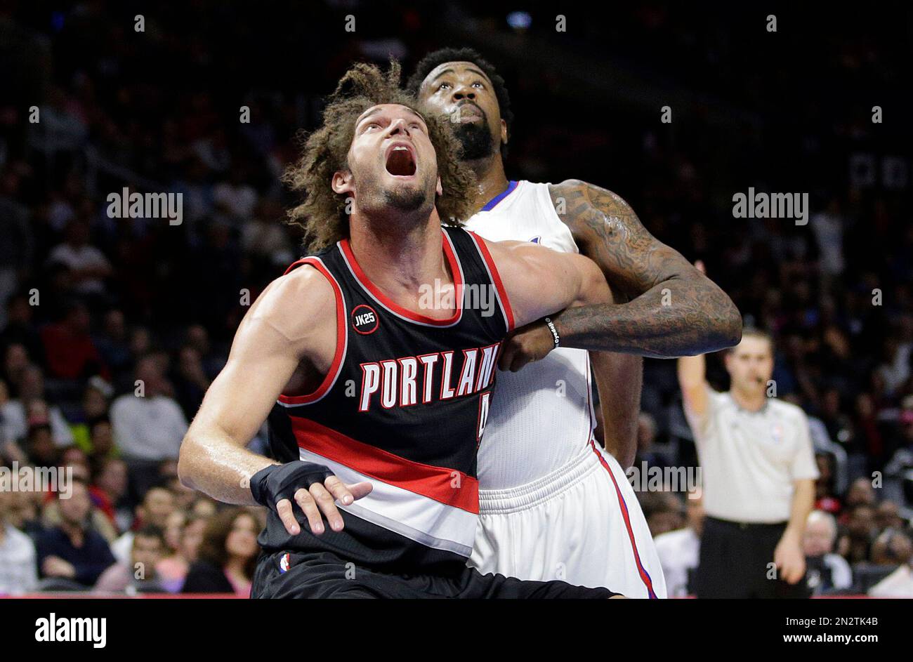 Portland Trail Blazers' Robin Lopez, front, and Los Angeles Clippers ...