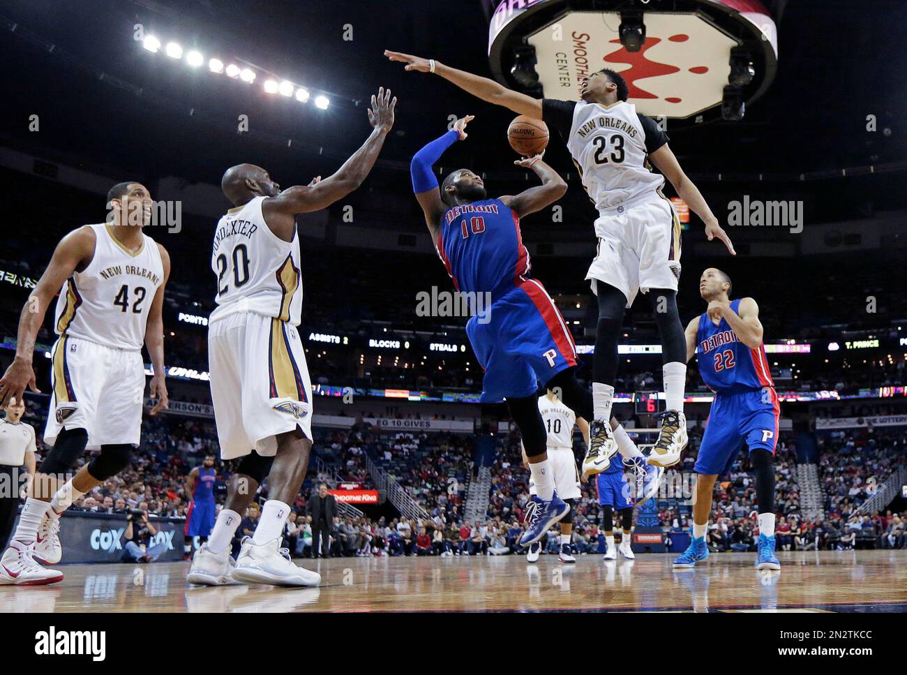 Detroit Pistons forward Greg Monroe (10) shoots between New Orleans ...
