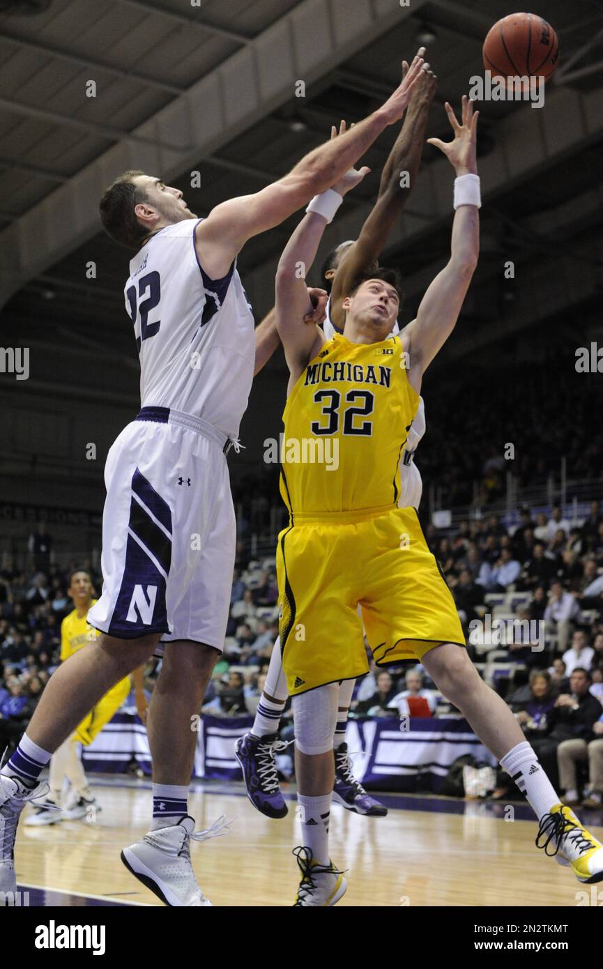 Michigan forward Ricky Doyle (32) shoots against Northwestern center ...