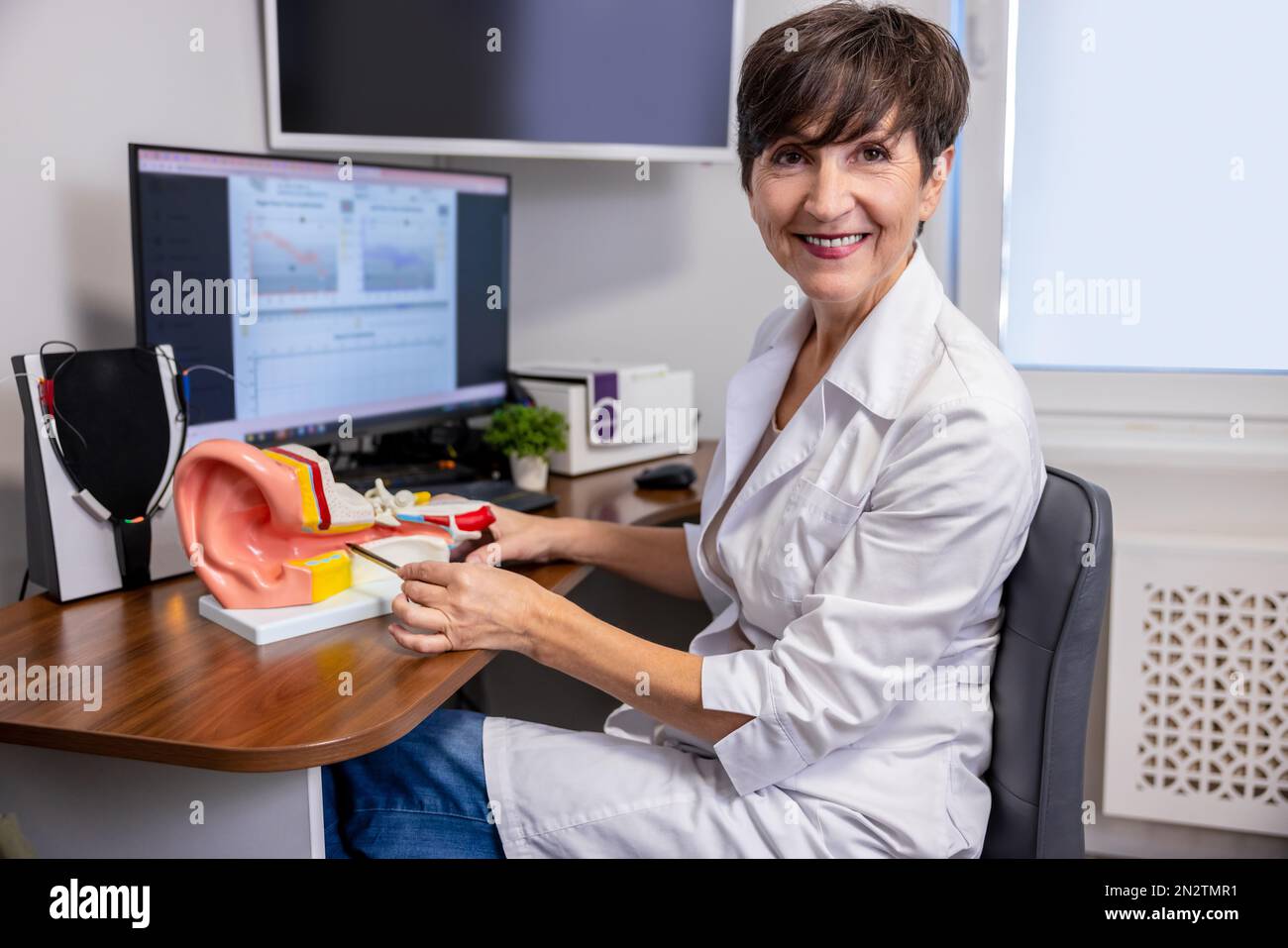 Hearing woman funnel hi-res stock photography and images - Alamy