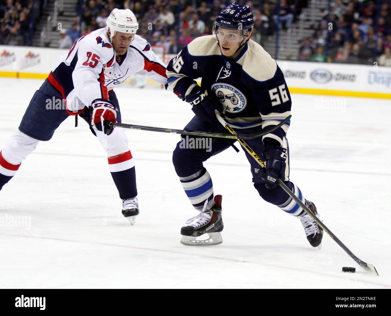 Columbus Blue Jackets' Marko Dano, right, of Austria, works for the ...
