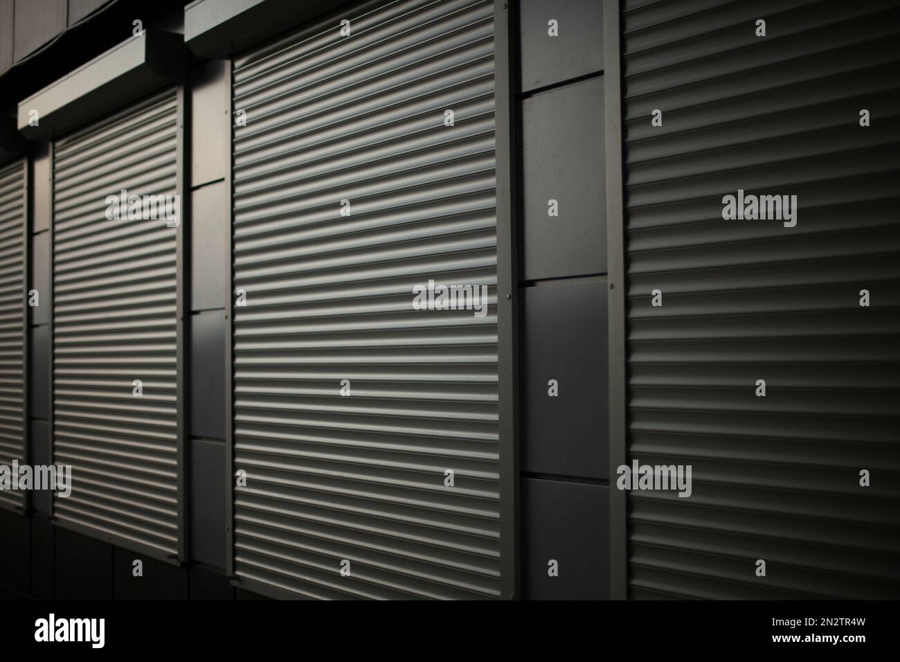 Closed shop. Steel blinds. Blinds on office windows. Ribbed surface ...