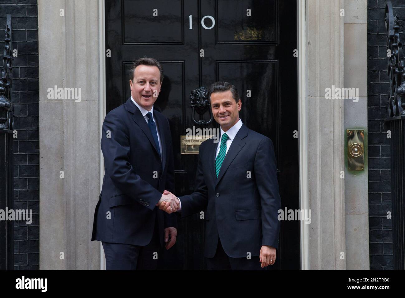 British Prime Minister David Cameron, left, greets the President of ...