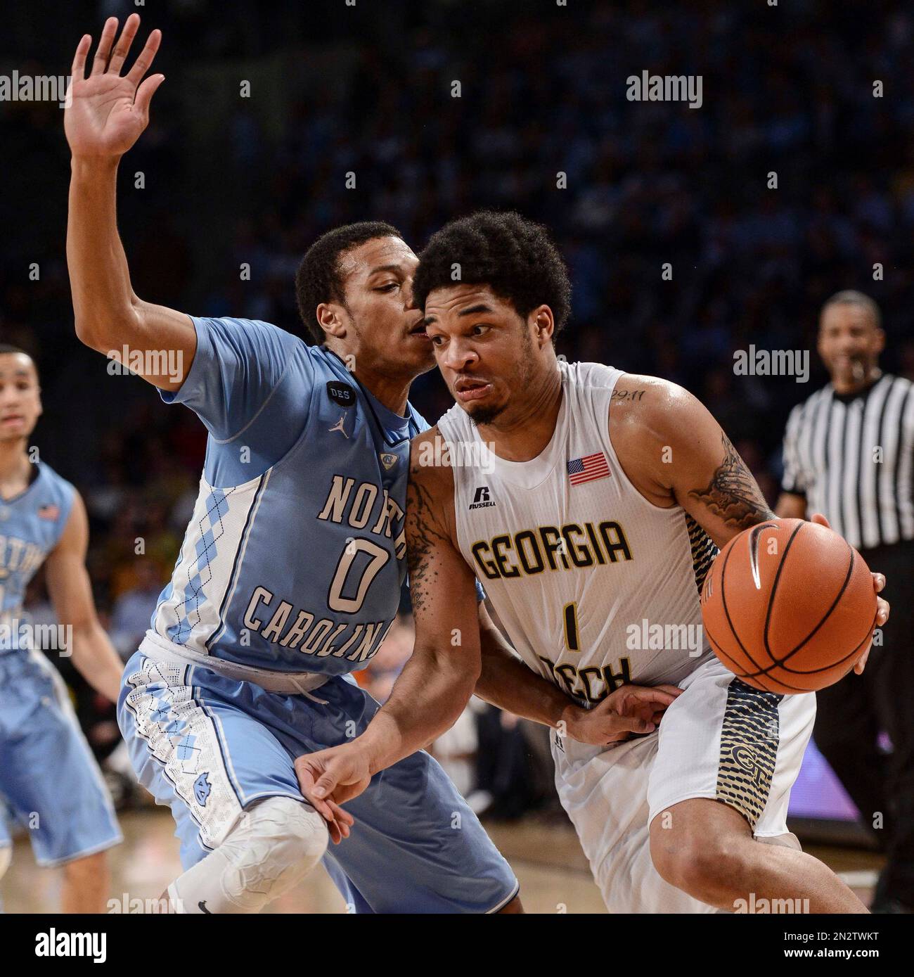 North Carolina guard Nate Britt (0) defends against Georgia Tech guard ...
