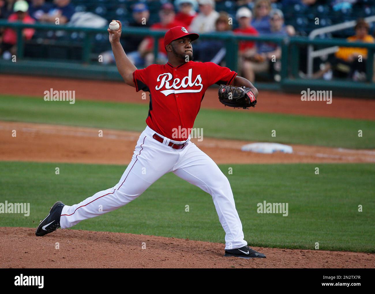 Cincinnati Reds' Keyvius Sampson pitches in during a spring training ...