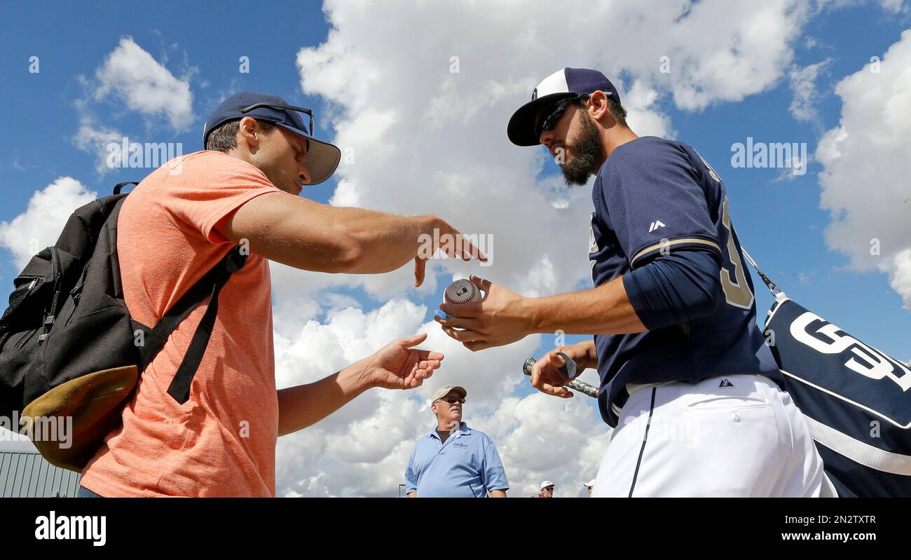 San Diego Padres' James Shields signs autographs during spring training ...