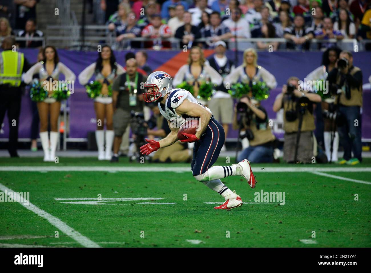 New England Patriots wide receiver Julian Edelman returns a pass during ...