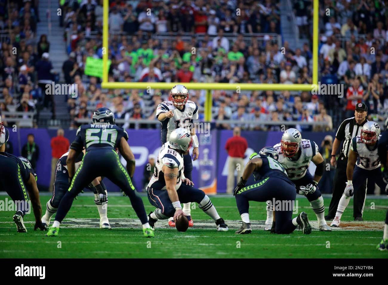New England Patriots quarterback Tom Brady (12) calls signals during ...