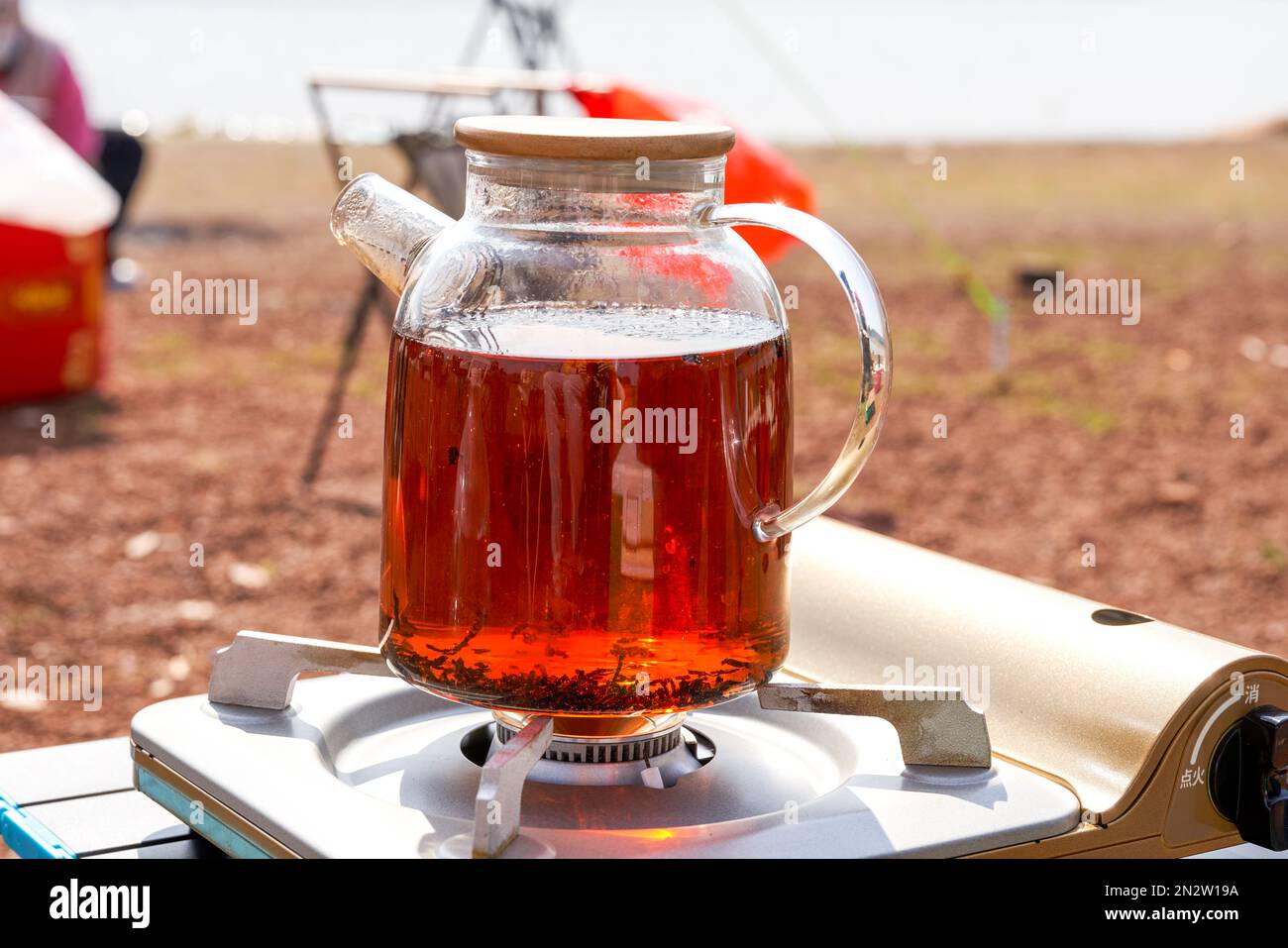 A pot of black tea burned in a picnic camping Stock Photo - Alamy