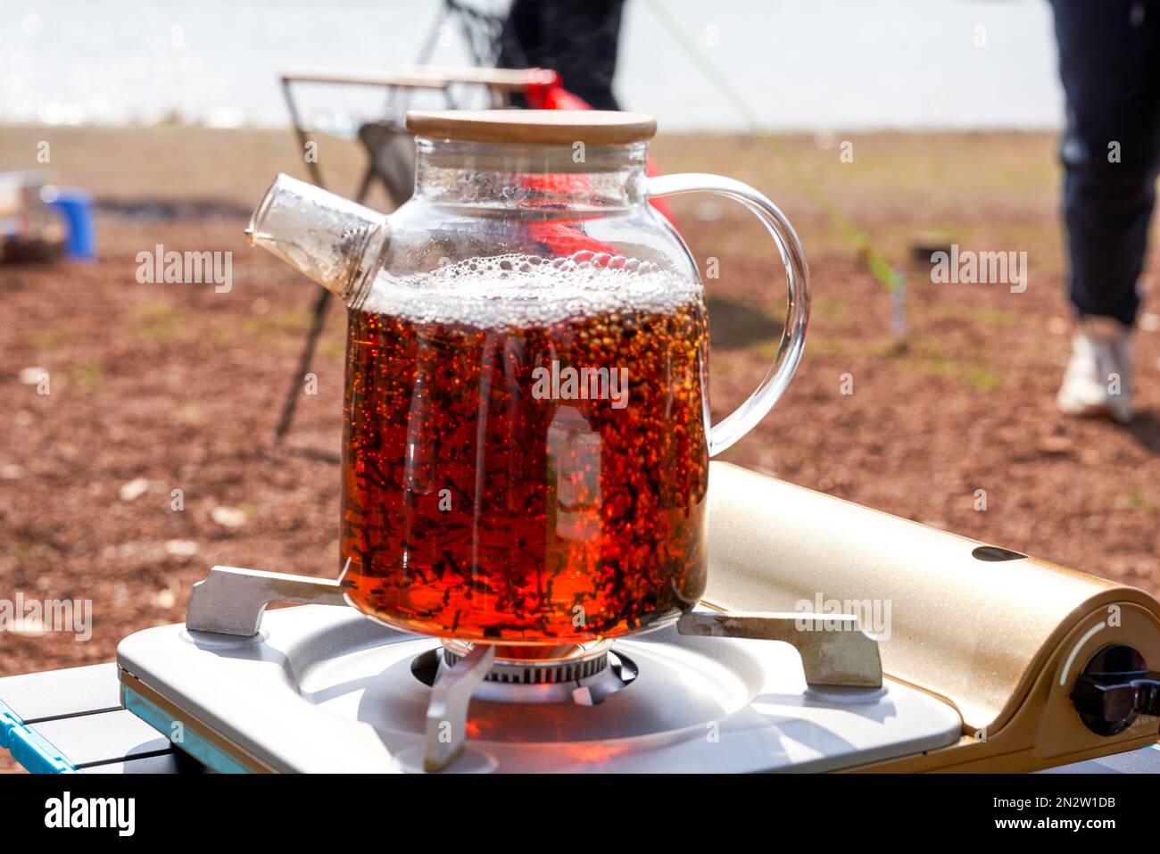 A pot of black tea burned in a picnic camping Stock Photo - Alamy