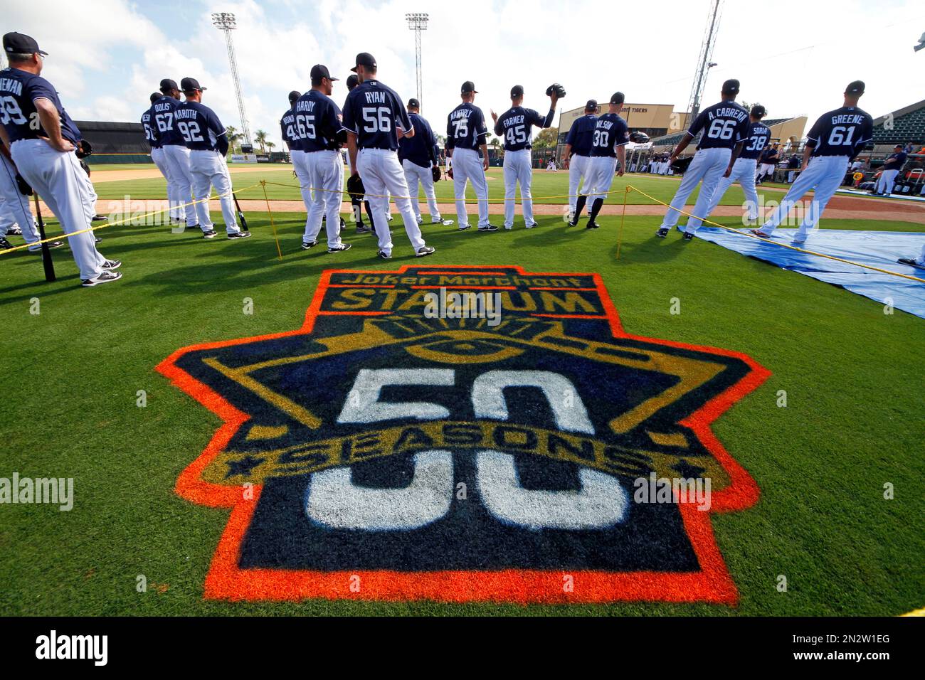 Detroit Tigers pitchers stand on the third baseline during a drill at ...