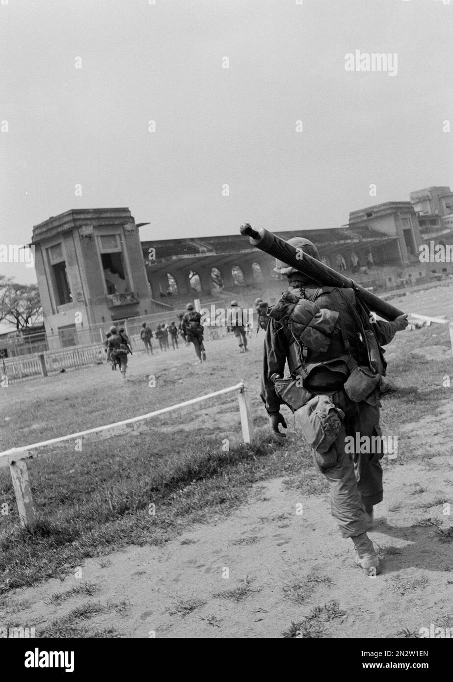 U.S. troops of the 199th Light Infantry Brigade march toward the ...