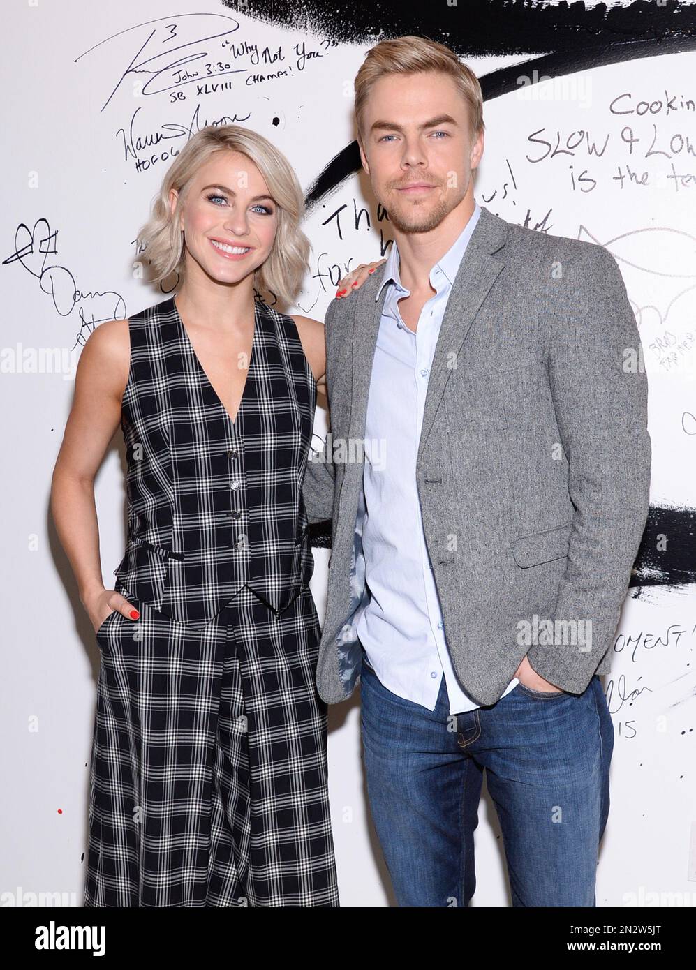 Dancers Derek Hough and Julianne Hough pose backstage before ...