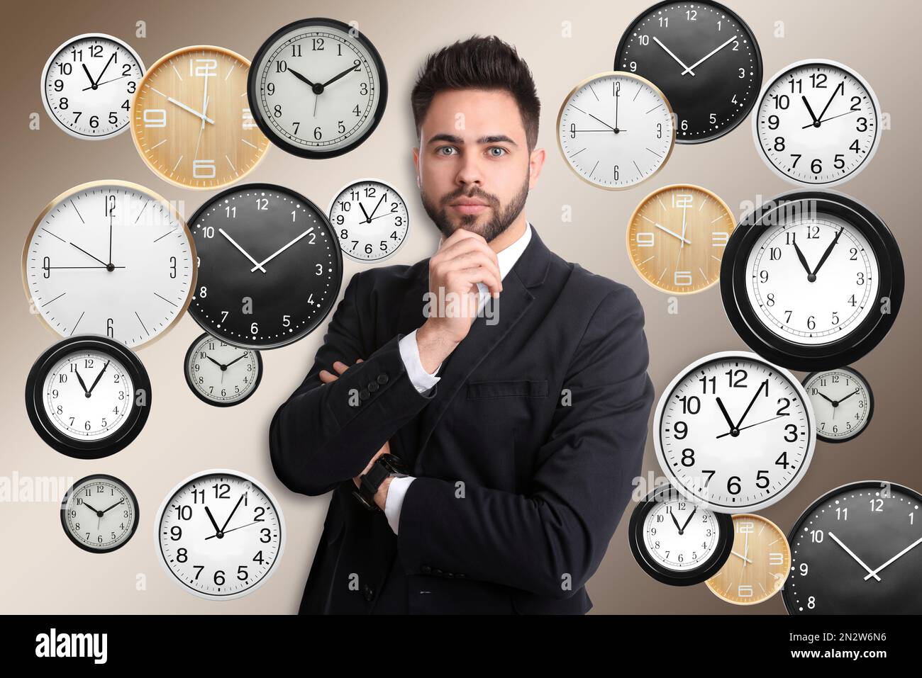Time management concept. Thoughtful businessman surrounded by different ...
