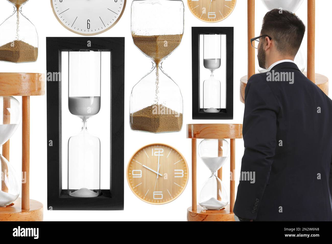 Time management concept. Businessman standing in front of different ...