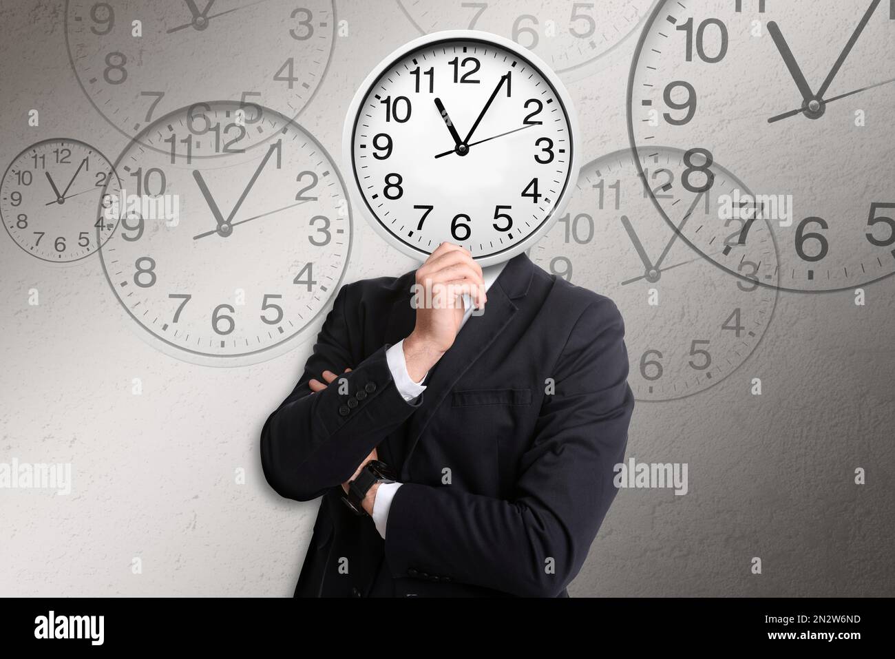 Time management concept. Businessman with clock instead of head on ...