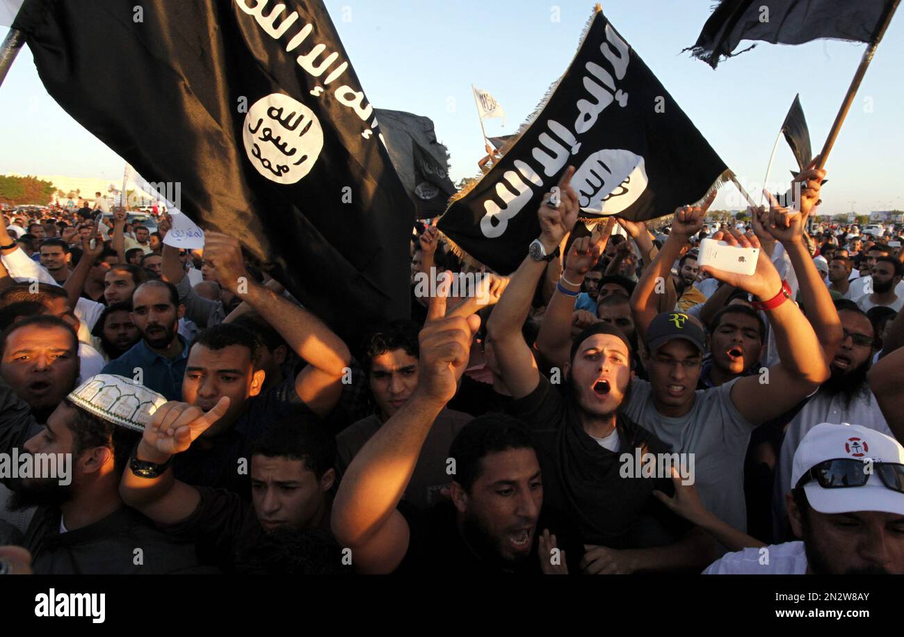 FILE - In this Sept. 21, 2012 file photo, Libyan followers of Ansar al ...
