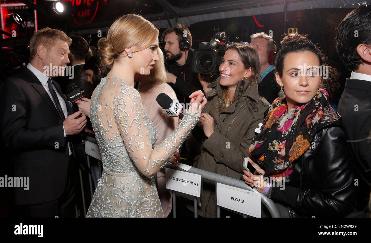 Lily James being interviews by AP's Marcela Isaza at the World Premiere ...