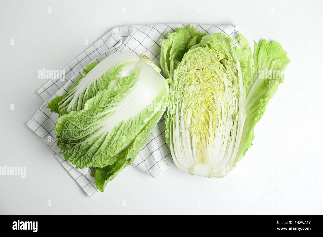 Fresh ripe Chinese cabbages on white table, top view Stock Photo - Alamy