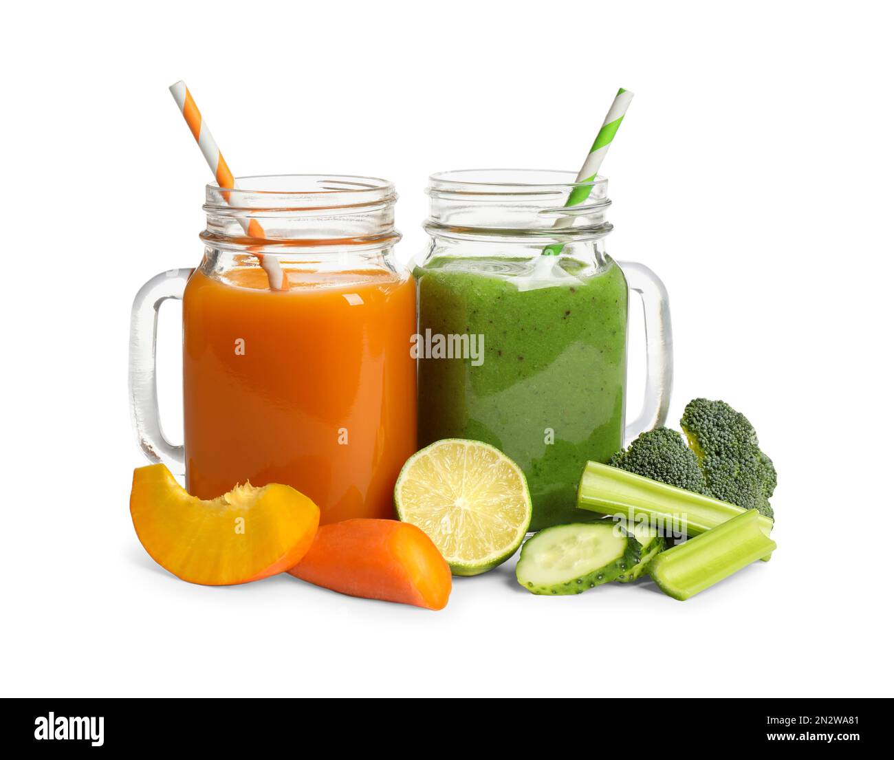 Delicious vegetable juices and fresh ingredients on white background ...