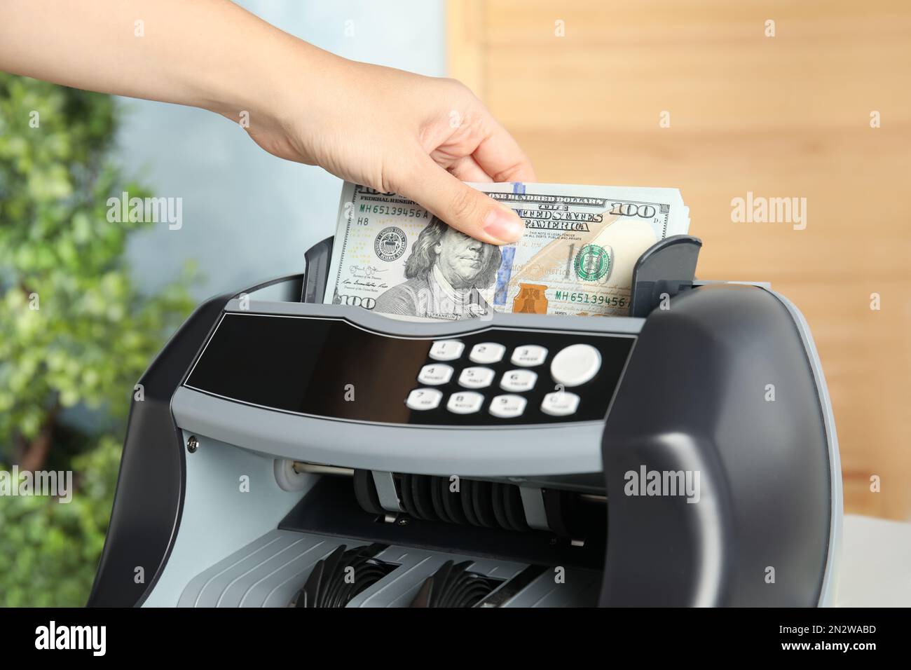 Counting dollars hand money counter hi-res stock photography and images ...