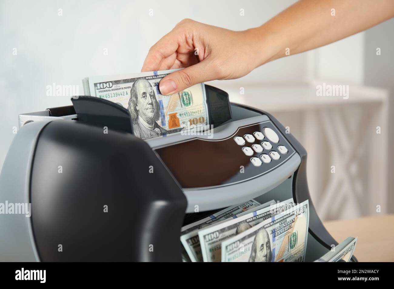 Counting machine hi-res stock photography and images - Alamy