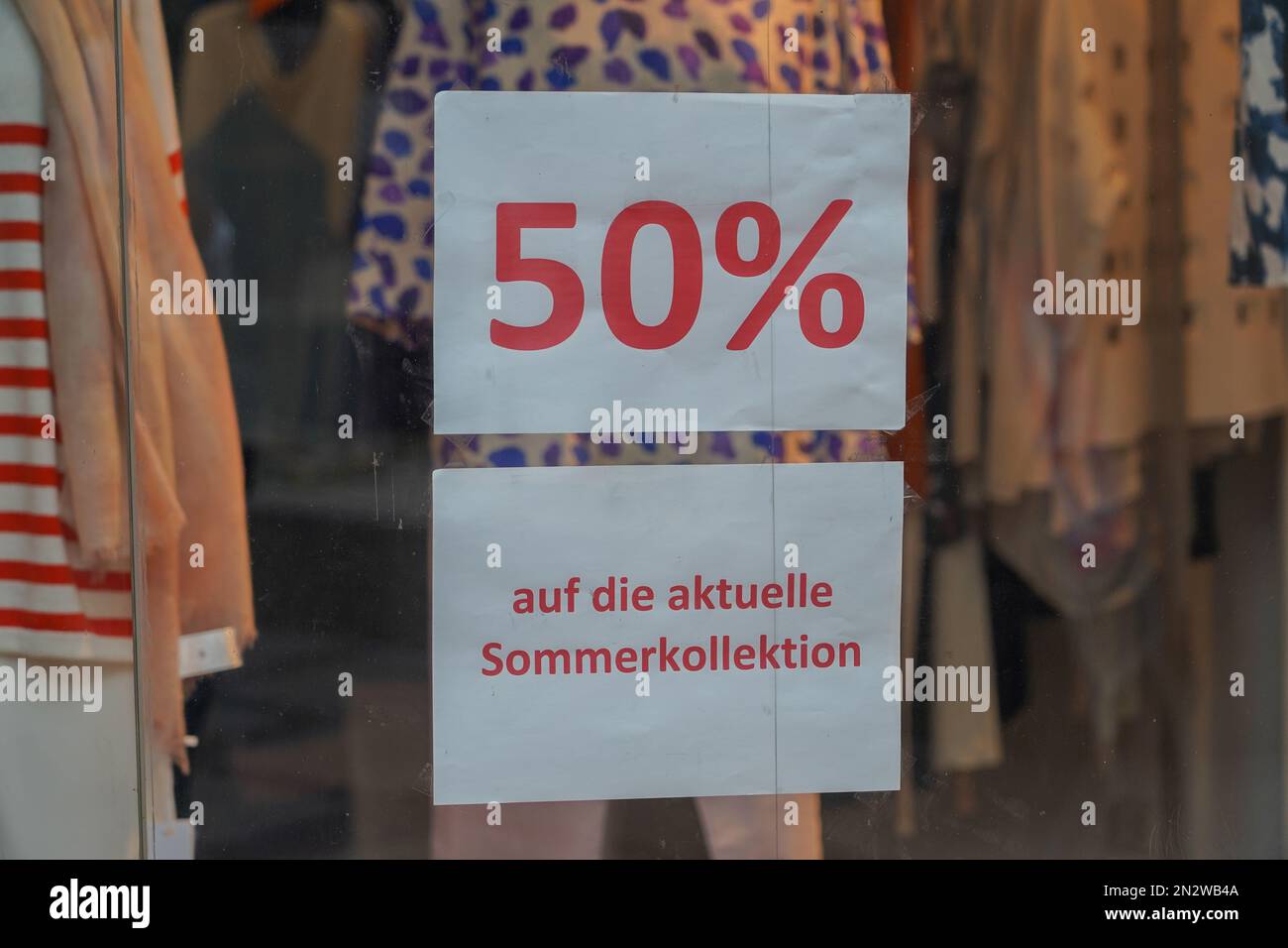 A Sign with the inscription "50 percent off the summer collection" in ...
