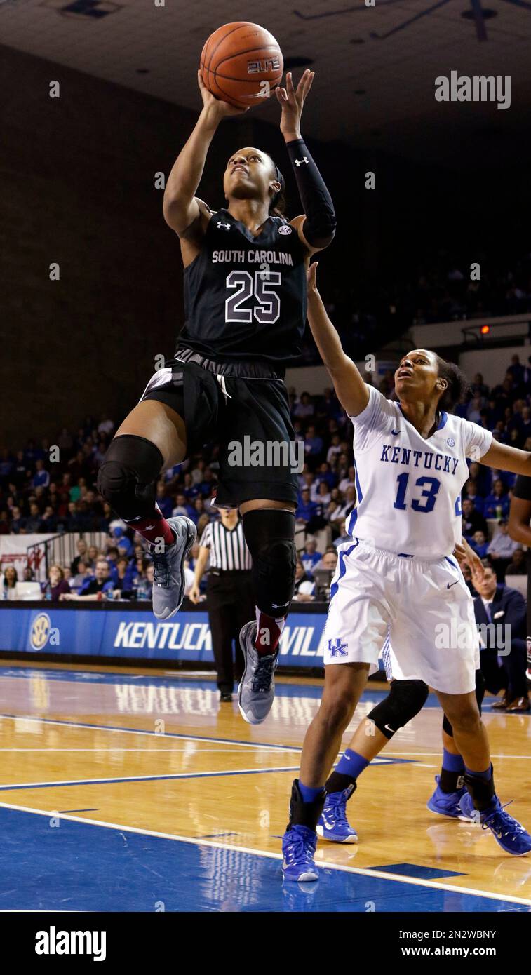 South Carolina's Tiffany Mitchell (25) shoots near Kentucky's Bria Goss ...
