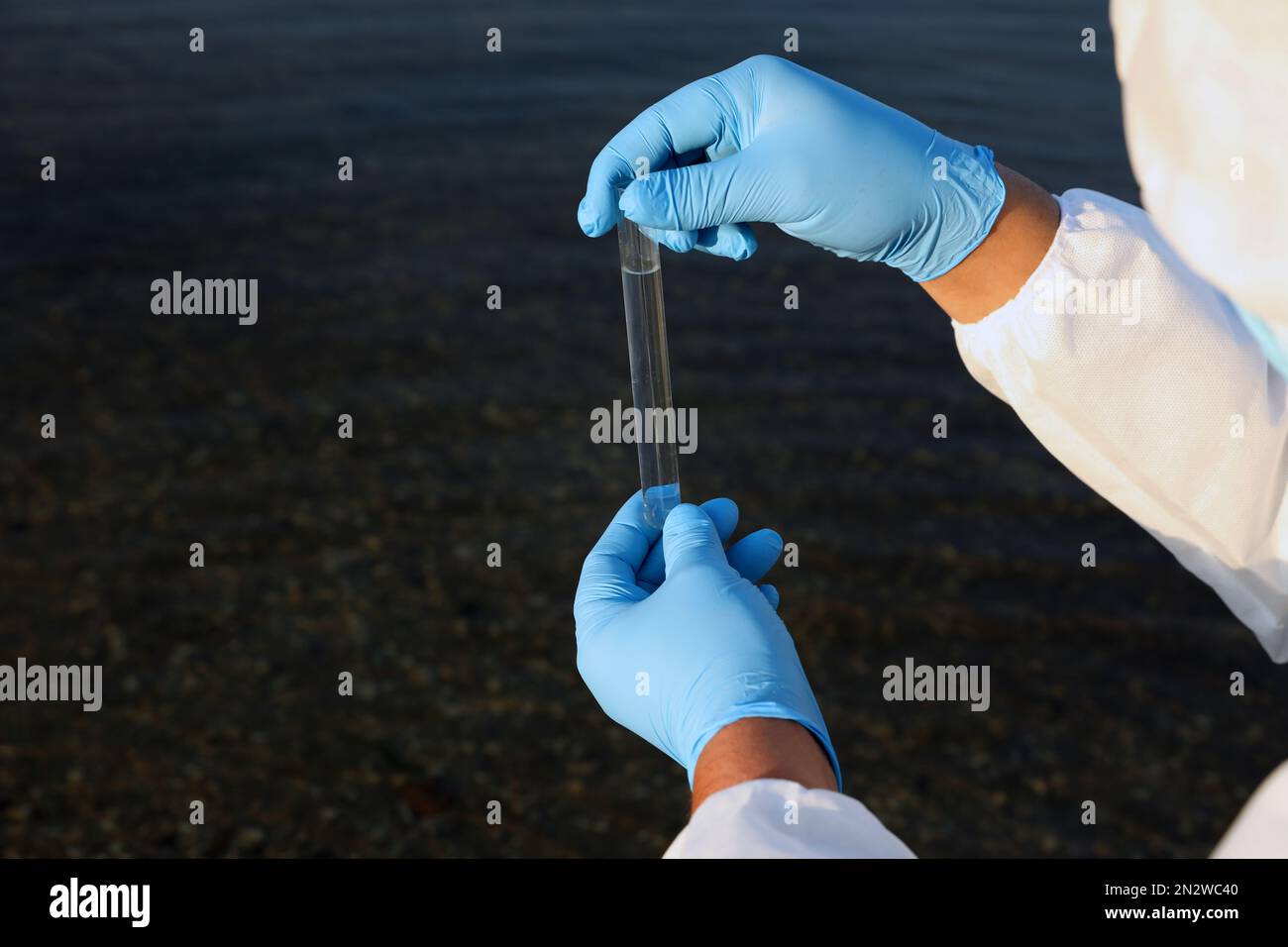 Worker taking water sample hi-res stock photography and images - Alamy