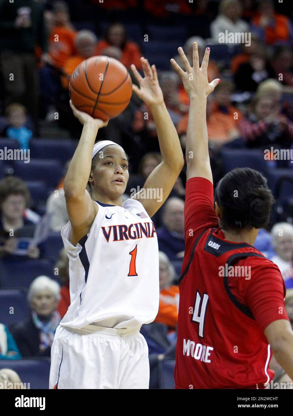 Virginia guard Mikayla Venson (1) shoots over Louisville forward Mariya ...