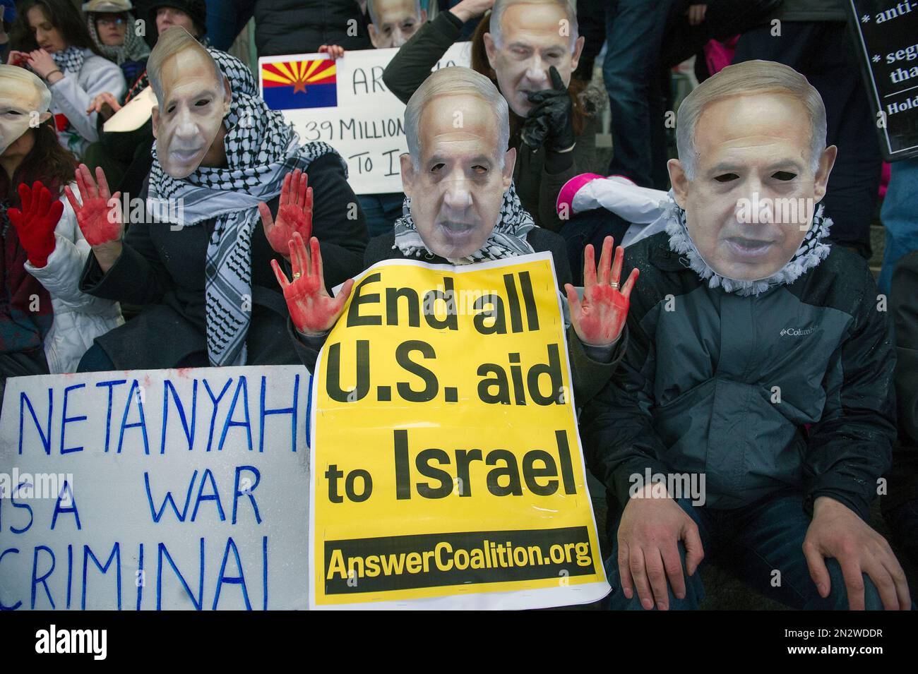 Pro-Palestine demonstrators wearing Israeli Prime Minister Benjamin ...