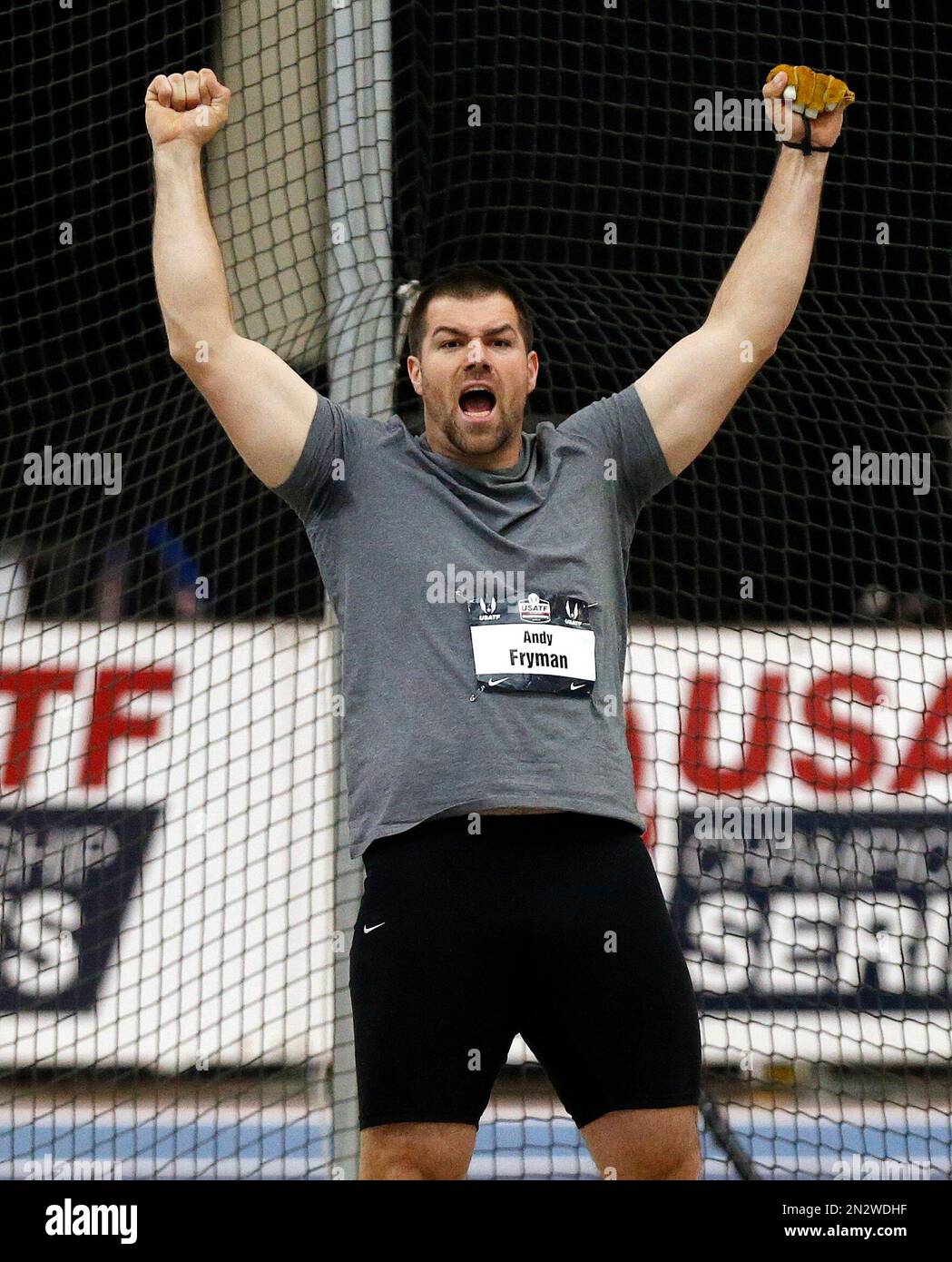 Andy Fryman reacts while competing in the men's weight throw during the ...