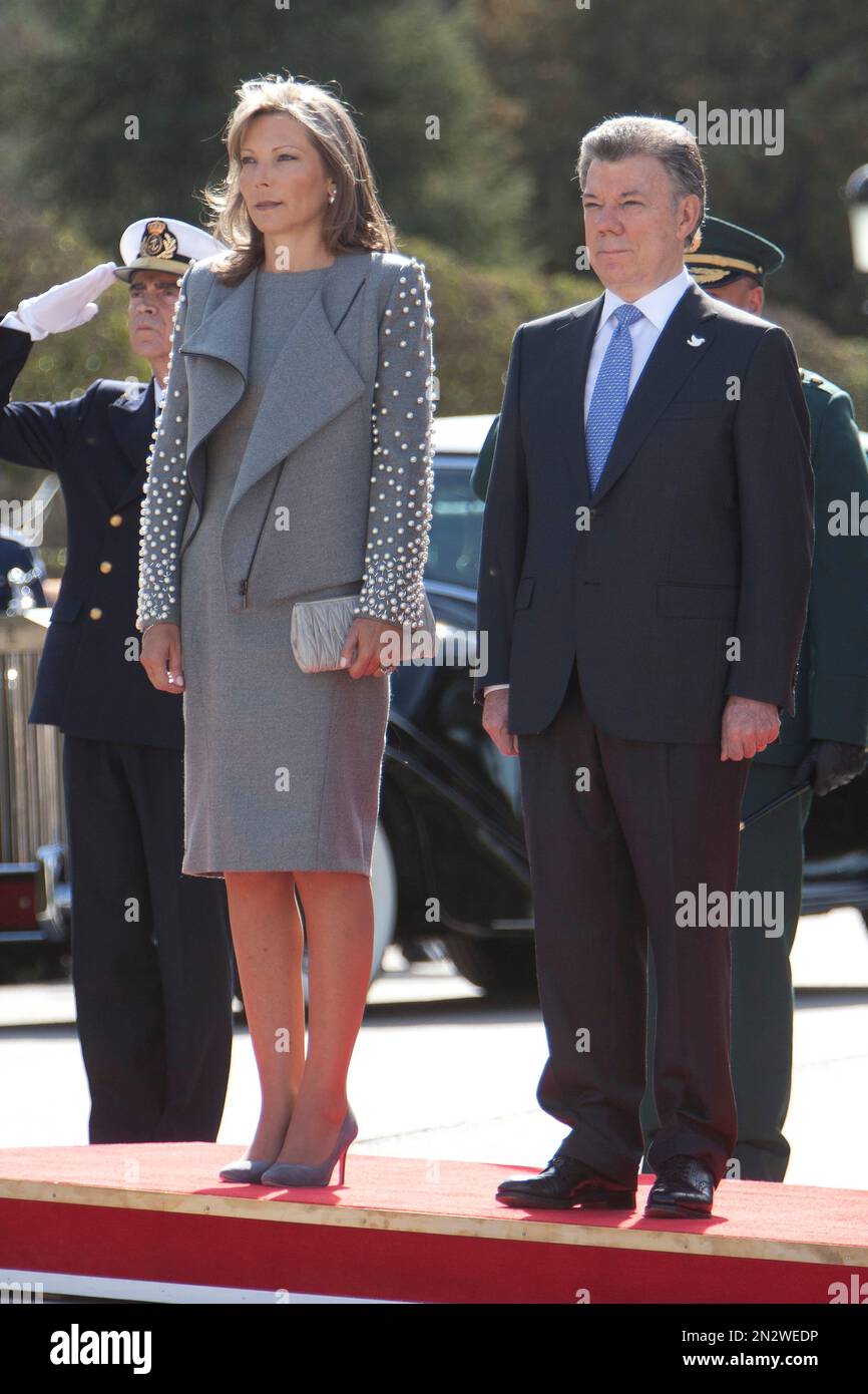 Colombia's President Juan Manuel Santos, right, and his wife Maria ...