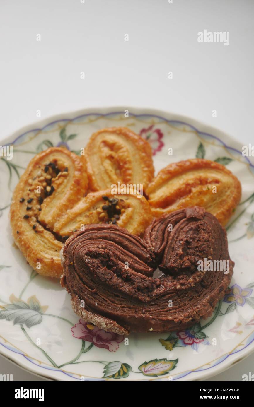 Delicious Butterfly pastry and afternoon tea Stock Photo - Alamy