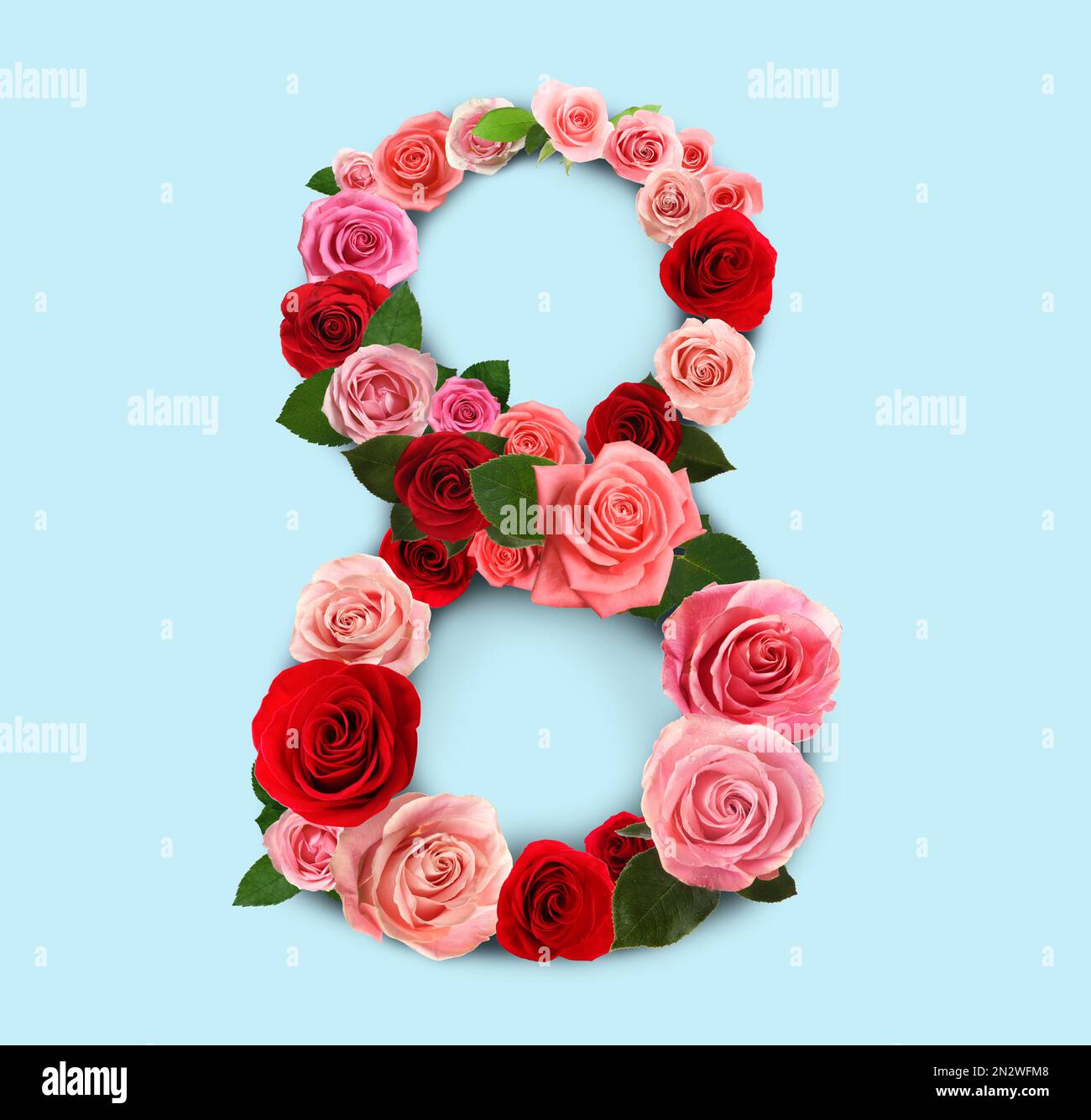 International women's day. Number 8 made of beautiful flowers on pale ...