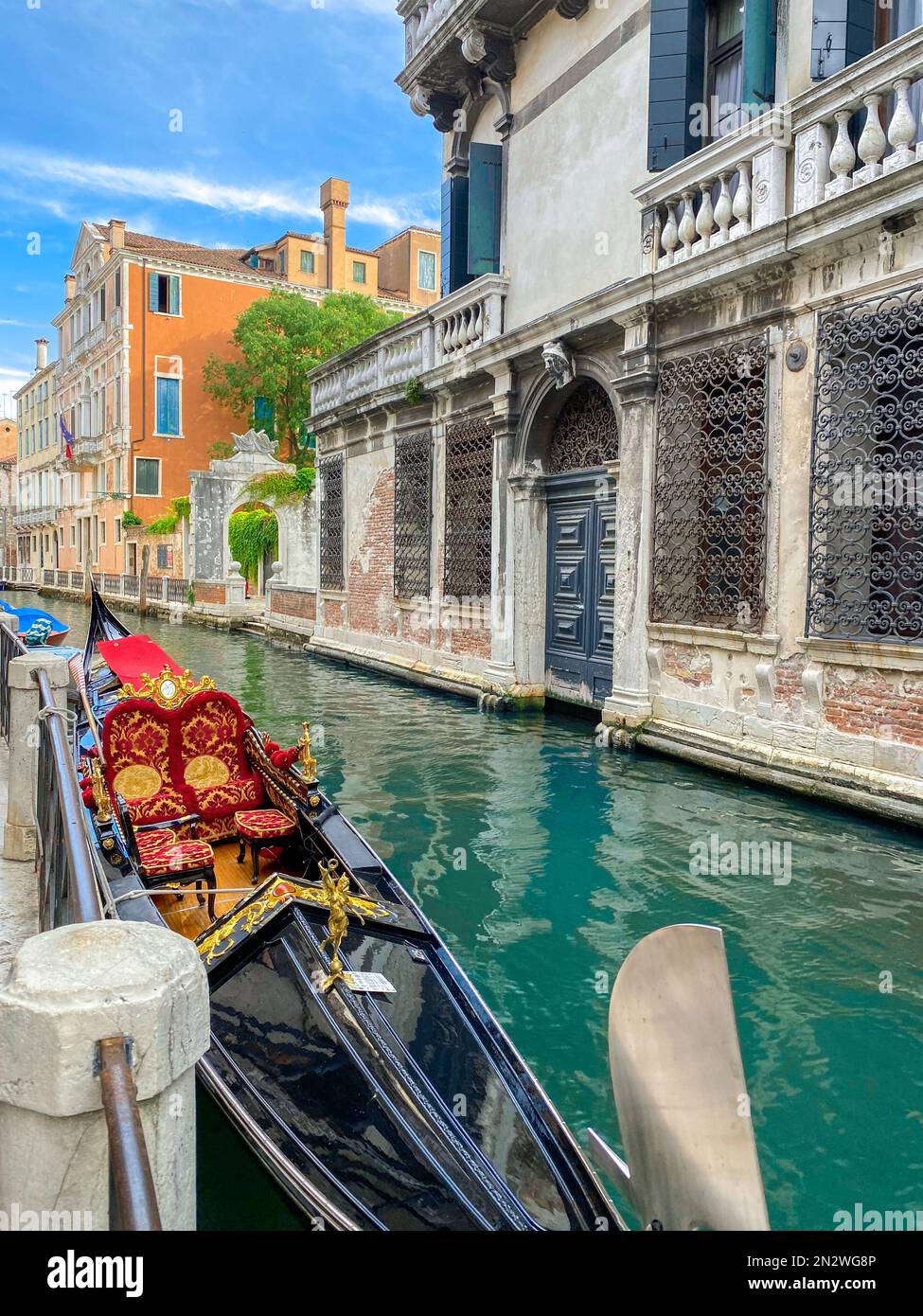 A vertical shot of gondolas in the canal Stock Photo - Alamy