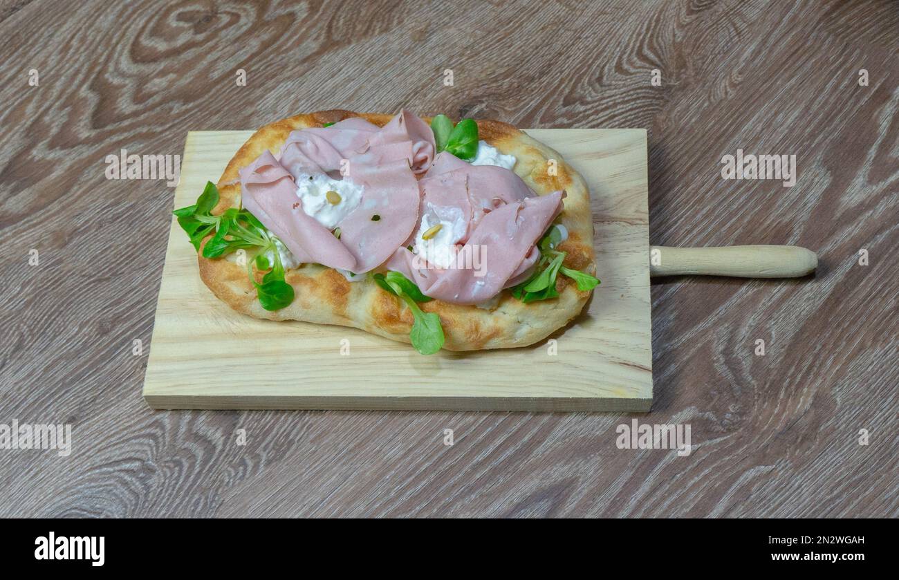 Roman pinsa, variant of the classic Italian pizza topped with ...